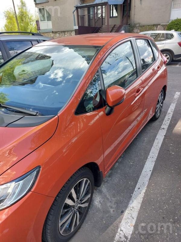 Orange Honda Jazz 2019 in Riga, with an engine capacity of 1.30 L and mileage of 8 thousand km for 2100 €, photo 2 on AUTOMOTO.COM.LV