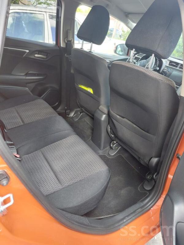 Orange Honda Jazz 2019 in Riga, with an engine capacity of 1.30 L and mileage of 8 thousand km for 2100 €, photo 5 on AUTOMOTO.COM.LV