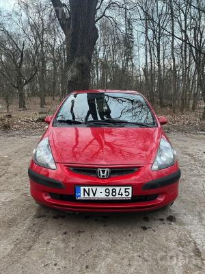 Red Honda Jazz 2002 in Riga, with an engine capacity of 1.30 L and mileage of 196 thousand km for 1449 €, photo 2 on AUTOMOTO.COM.LV