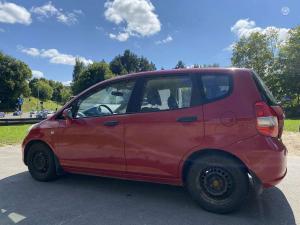Red Honda Jazz 2004 in Vilnius, with an engine capacity of 1.34 L and mileage of 129 thousand km for 550 €, photo 11 on AUTOMOTO.COM.LV