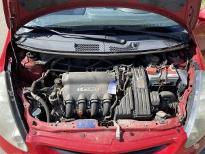Red Honda Jazz 2004 in Vilnius, with an engine capacity of 1.34 L and mileage of 129 thousand km for 550 €, photo 19 on AUTOMOTO.COM.LV