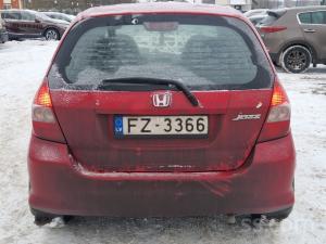 Red Honda Jazz 2006 in Riga, with an engine capacity of 1.40 L and mileage of 0 thousand km for 830 €, photo 8 on AUTOMOTO.COM.LV