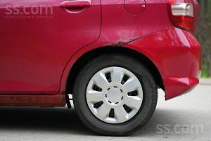 Red Honda Jazz 2007 in Riga, with an engine capacity of 1.40 L and mileage of 233 thousand km for 1500 €, photo 9 on AUTOMOTO.COM.LV