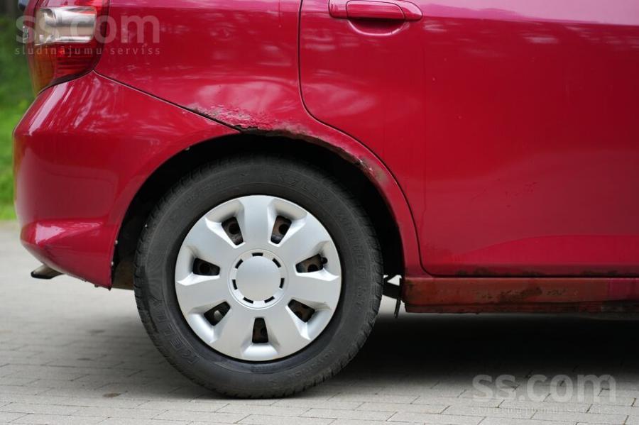 Red Honda Jazz 2007 in Riga, with an engine capacity of 1.40 L and mileage of 233 thousand km for 1500 €, photo 10 on AUTOMOTO.COM.LV