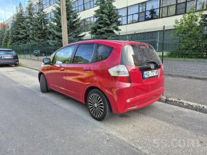 Red Honda Jazz 2009 in Riga, with an engine capacity of 1.20 L and mileage of 141 thousand km for 2200 €, photo 4 on AUTOMOTO.COM.LV