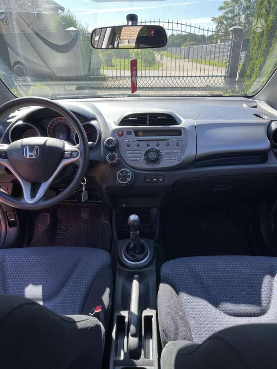 Sarkans Honda Jazz 2010 Klaipėda, ar dzinēja tilpumu 1.20 L un nobraukumu 147 tūkst. km par 2900 €, foto 9 vietnē AUTOMOTO.COM.LV