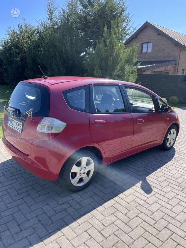 Sarkans Honda Jazz 2010 Klaipėda, ar dzinēja tilpumu 1.20 L un nobraukumu 147 tūkst. km par 2900 €, foto 4 vietnē AUTOMOTO.COM.LV