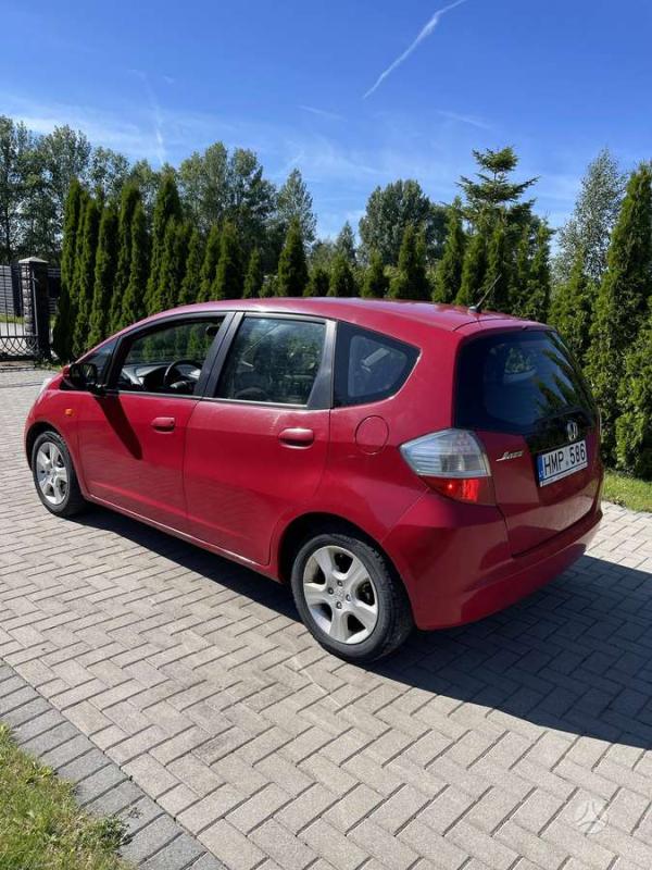 Sarkans Honda Jazz 2010 Klaipėda, ar dzinēja tilpumu 1.20 L un nobraukumu 147 tūkst. km par 2900 €, foto 5 vietnē AUTOMOTO.COM.LV