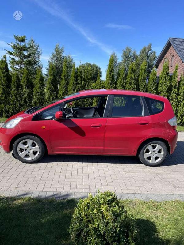 Sarkans Honda Jazz 2010 Klaipėda, ar dzinēja tilpumu 1.20 L un nobraukumu 147 tūkst. km par 2900 €, foto 6 vietnē AUTOMOTO.COM.LV