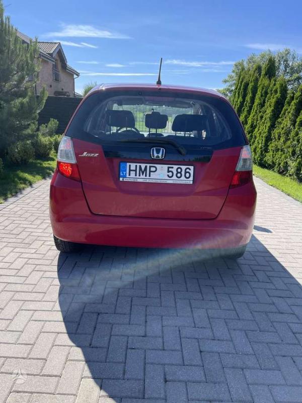 Sarkans Honda Jazz 2010 Klaipėda, ar dzinēja tilpumu 1.20 L un nobraukumu 147 tūkst. km par 2900 €, foto 7 vietnē AUTOMOTO.COM.LV