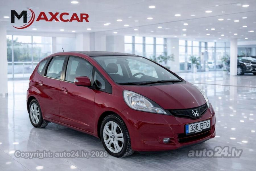 Red Honda Jazz 2011 in Tallinn, with an engine capacity of 1.30 L and mileage of 180 thousand km for 3999 €, photo 1 on AUTOMOTO.COM.LV