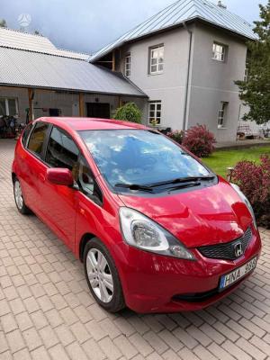 Red Honda Jazz 2011 in Kaunas, with an engine capacity of 1.20 L and mileage of 229 thousand km for 2700 €, photo  on AUTOMOTO.COM.LV