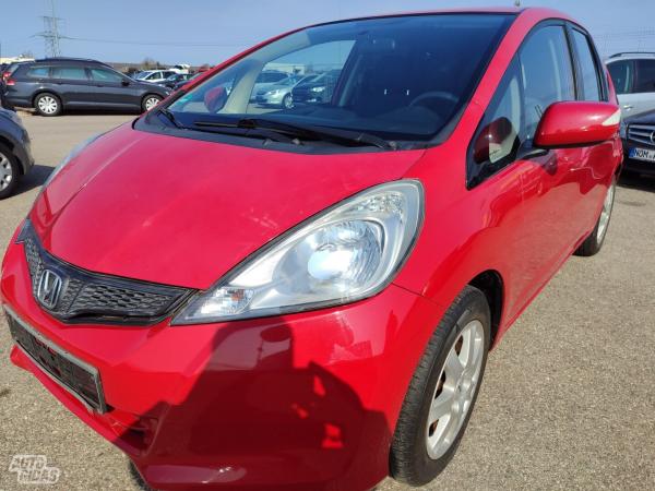 Red Honda Jazz 2012 in Marijampole, with an engine capacity of 1.30 L and mileage of 184 thousand km for 3650 €, photo 1 on AUTOMOTO.COM.LV