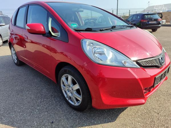 Red Honda Jazz 2012 in Marijampole, with an engine capacity of 1.30 L and mileage of 184 thousand km for 3650 €, photo 2 on AUTOMOTO.COM.LV