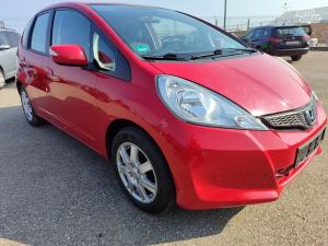 Red Honda Jazz 2012 in Marijampole, with an engine capacity of 1.30 L and mileage of 184 thousand km for 3650 €, photo 3 on AUTOMOTO.COM.LV