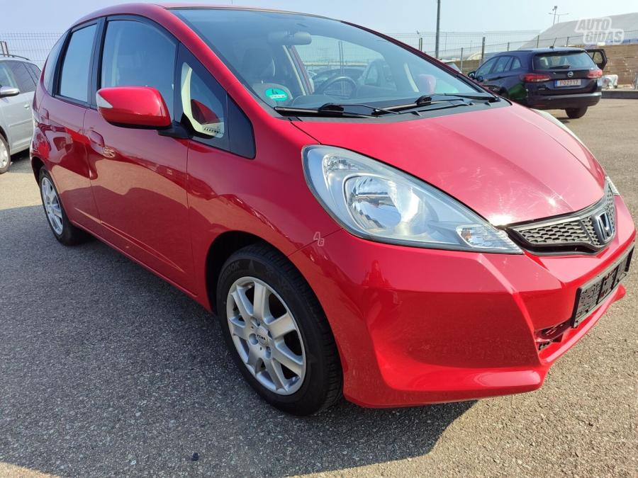 Red Honda Jazz 2012 in Marijampole, with an engine capacity of 1.30 L and mileage of 184 thousand km for 3650 €, photo 3 on AUTOMOTO.COM.LV