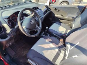 Red Honda Jazz 2012 in Marijampole, with an engine capacity of 1.30 L and mileage of 184 thousand km for 3650 €, photo 6 on AUTOMOTO.COM.LV