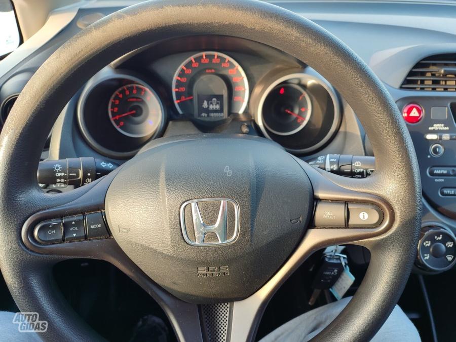 Red Honda Jazz 2012 in Marijampole, with an engine capacity of 1.30 L and mileage of 184 thousand km for 3650 €, photo 8 on AUTOMOTO.COM.LV
