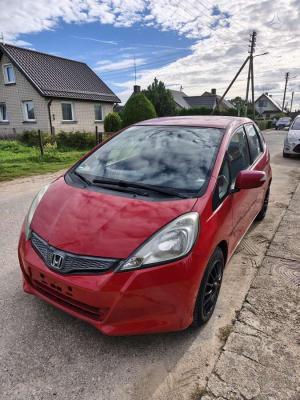 Sarkans Honda Jazz 2012 Marijampole, ar dzinēja tilpumu 1.34 L un nobraukumu 176 tūkst. km par 3600 €, foto  vietnē AUTOMOTO.COM.LV
