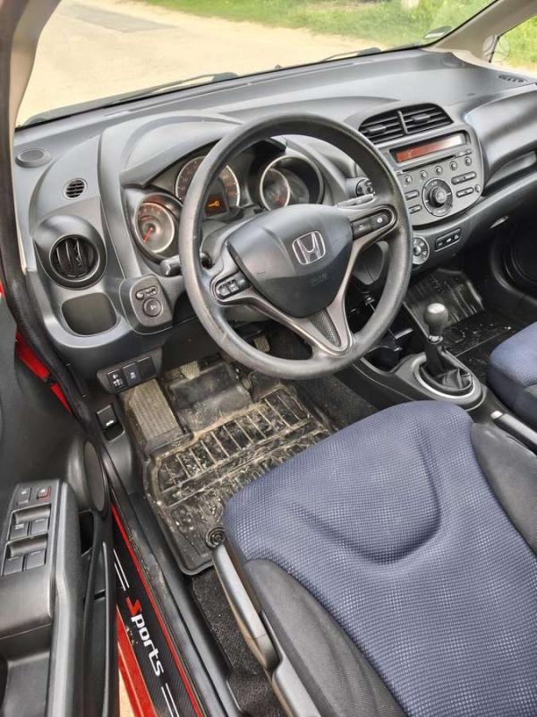 Sarkans Honda Jazz 2012 Marijampole, ar dzinēja tilpumu 1.34 L un nobraukumu 176 tūkst. km par 3600 €, foto 9 vietnē AUTOMOTO.COM.LV