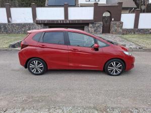 Red Honda Jazz 2015 in Vilnius, with an engine capacity of 1.50 L and mileage of 48 thousand km for 5900 €, photo 4 on AUTOMOTO.COM.LV