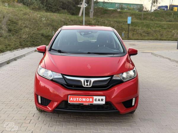 Red Honda Jazz 2016 in Vilnius, with an engine capacity of 1.30 L and mileage of 213 thousand km for 7950 €, photo 3 on AUTOMOTO.COM.LV