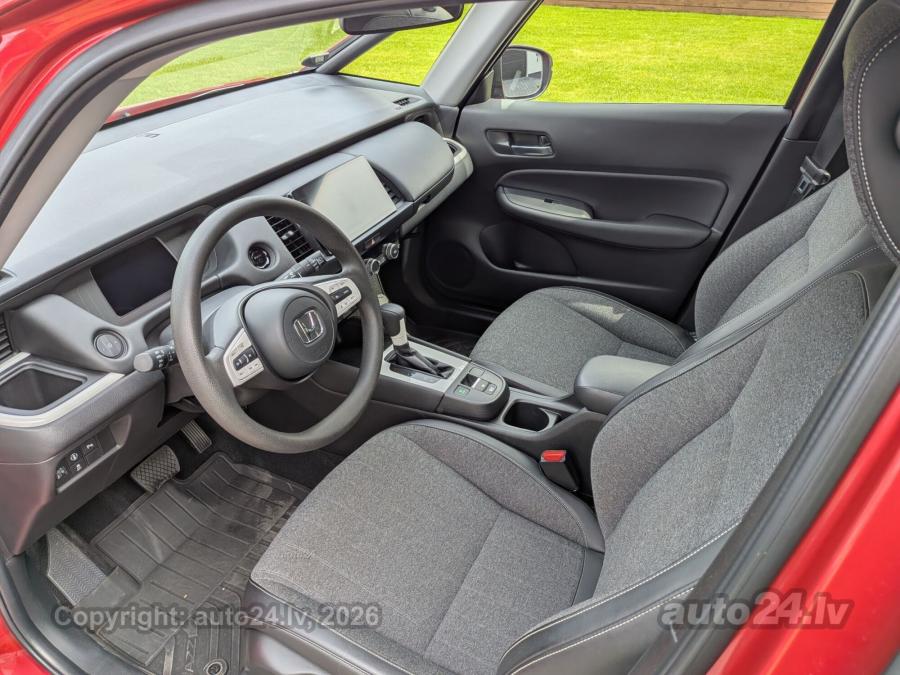 Red Honda Jazz 2021 in Tallinn, with an engine capacity of 1.50 L and mileage of 64 thousand km for 17800 €, photo 11 on AUTOMOTO.COM.LV