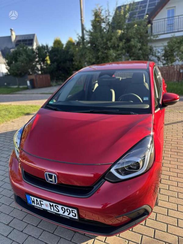 Sarkans Honda Jazz 2022 Vievis, ar dzinēja tilpumu 1.50 L un nobraukumu 25 tūkst. km par 17800 €, foto 2 vietnē AUTOMOTO.COM.LV