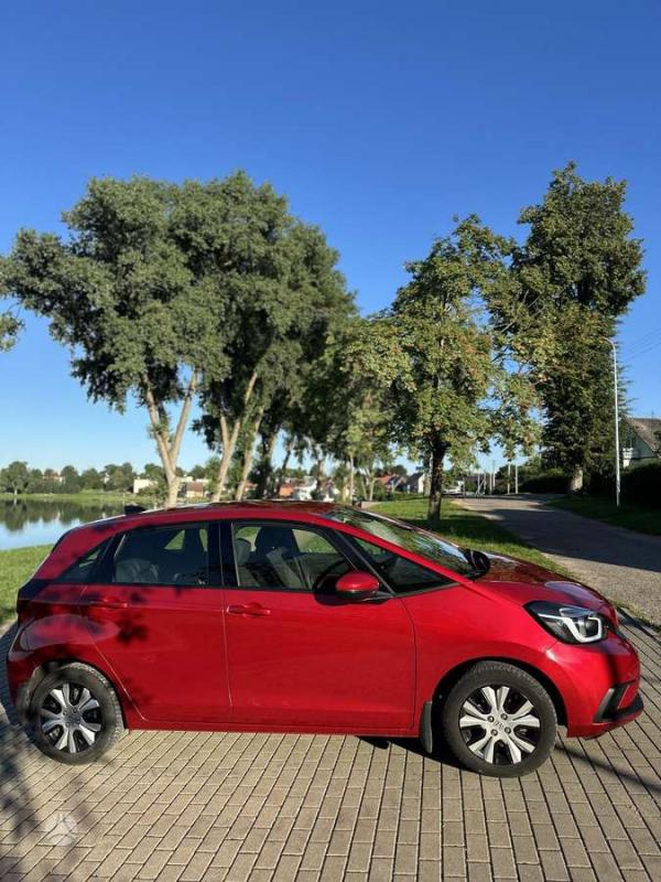 Sarkans Honda Jazz 2022 Vievis, ar dzinēja tilpumu 1.50 L un nobraukumu 25 tūkst. km par 17800 €, foto 10 vietnē AUTOMOTO.COM.LV