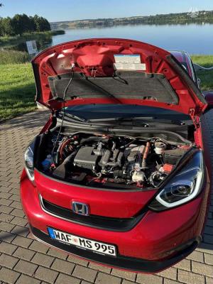 Sarkans Honda Jazz 2022 Vievis, ar dzinēja tilpumu 1.50 L un nobraukumu 25 tūkst. km par 17800 €, foto 28 vietnē AUTOMOTO.COM.LV