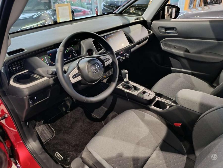 Red Honda Jazz 2026 in Vilnius, with an engine capacity of 1.50 L and mileage of 0 thousand km for 23490 €, photo 6 on AUTOMOTO.COM.LV