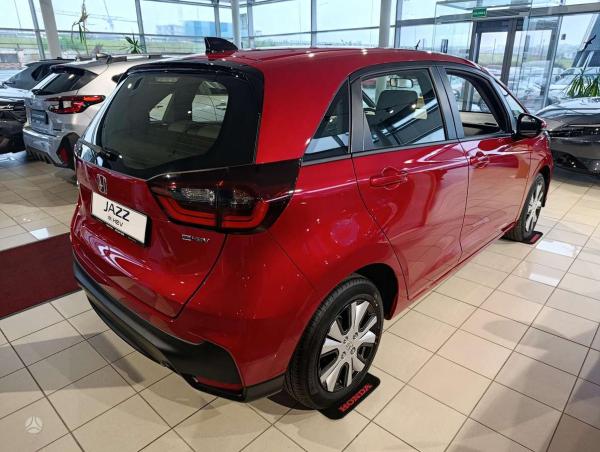 Honda Jazz 2026 in Vilnius on AUTOMOTO.COM.LV Red Honda Jazz 2026 in Vilnius, with an engine capacity of 1.50 L and mileage of 0 thousand km for 23490 €, photo 5 on AUTOMOTO.COM.LV