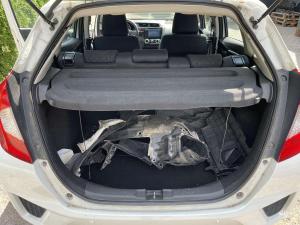 White Honda Jazz 2016 in Panevezys, with an engine capacity of 1.40 L and mileage of 58 thousand km for 2900 €, photo 9 on AUTOMOTO.COM.LV
