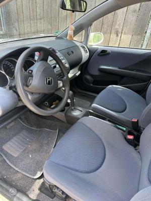 Yellow Honda Jazz 2004 in Kaunas, with an engine capacity of 1.34 L and mileage of 133 thousand km for 1200 €, photo 6 on AUTOMOTO.COM.LV