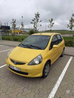 Yellow Honda Jazz 2006 in Kaunas, with an engine capacity of 1.24 L and mileage of 285 thousand km for 549 €, photo 1 on AUTOMOTO.COM.LV