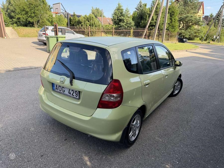 Yellow Honda Jazz 2008 in Vilnius, with an engine capacity of 1.34 L and mileage of 150 thousand km for 2850 €, photo 6 on AUTOMOTO.COM.LV