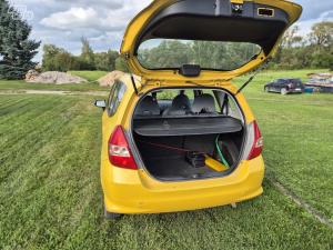 Yellow Honda Jazz 2008 in Panevezys, with an engine capacity of 1.30 L and mileage of 243 thousand km for 1700 €, photo 10 on AUTOMOTO.COM.LV