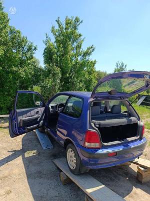 Violet Honda Logo 2000 in Druskininkai, with an engine capacity of 1.34 L and mileage of 199 thousand km for 550 €, photo 14 on AUTOMOTO.COM.LV