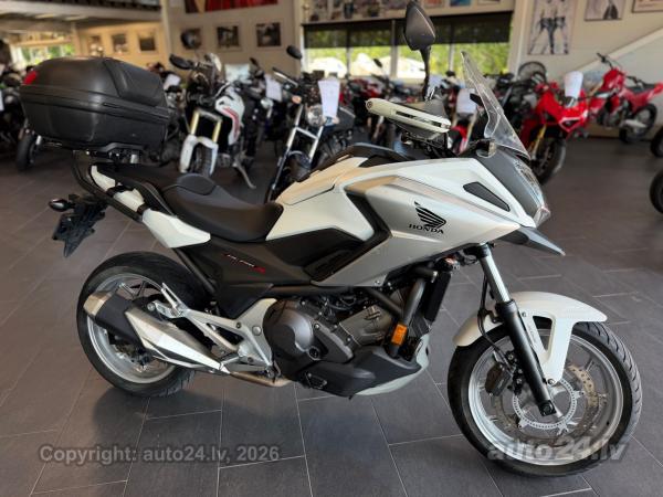 White Honda NC 750 2016 in Tallinn, with an engine capacity of 0.75 L and mileage of 35 thousand km for 4590 €, photo 1 on AUTOMOTO.COM.LV
