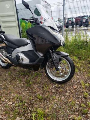 Melns Honda NC 2012 Kauņa, ar dzinēja tilpumu 0.70 L un nobraukumu 70 tūkst. km par 1800 €, foto 9 vietnē AUTOMOTO.COM.LV