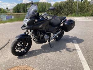 Black Honda NC 2012 in Utena, with an engine capacity of 0.70 L and mileage of 53 thousand km for 3850 €, photo  on AUTOMOTO.COM.LV