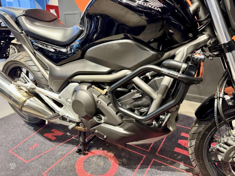 Melns Honda NC 2013 Viļņa, ar dzinēja tilpumu 0.70 L un nobraukumu 20 tūkst. km par 3499 €, foto 18 vietnē AUTOMOTO.COM.LV