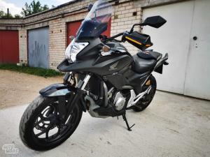 Black Honda NC 2013 in Panevezys, with an engine capacity of 0.67 L and mileage of 81 thousand km for 3450 €, photo  on AUTOMOTO.COM.LV