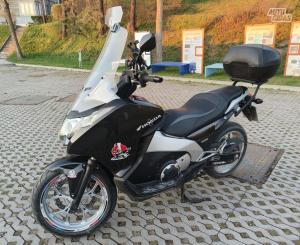 Black Honda NC 2013 in Kaunas, with an engine capacity of 0.70 L and mileage of 30 thousand km for 3300 €, photo  on AUTOMOTO.COM.LV