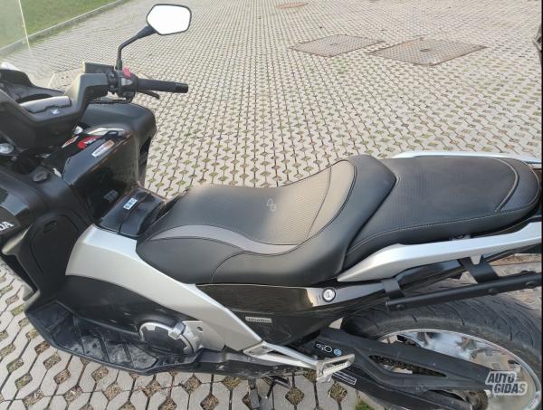 Melns Honda NC 2013 Kauņa, ar dzinēja tilpumu 0.70 L un nobraukumu 30 tūkst. km par 3300 €, foto 5 vietnē AUTOMOTO.COM.LV