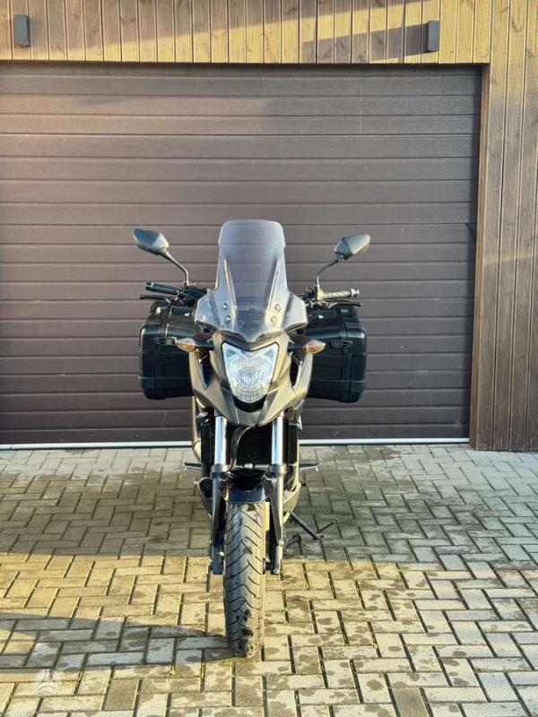 Black Honda NC 2013 in Panevezys, with an engine capacity of 0.70 L and mileage of 30 thousand km for 3900 €, photo 2 on AUTOMOTO.COM.LV