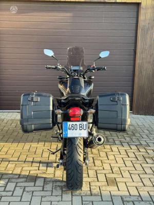 Black Honda NC 2013 in Panevezys, with an engine capacity of 0.70 L and mileage of 30 thousand km for 3900 €, photo 8 on AUTOMOTO.COM.LV
