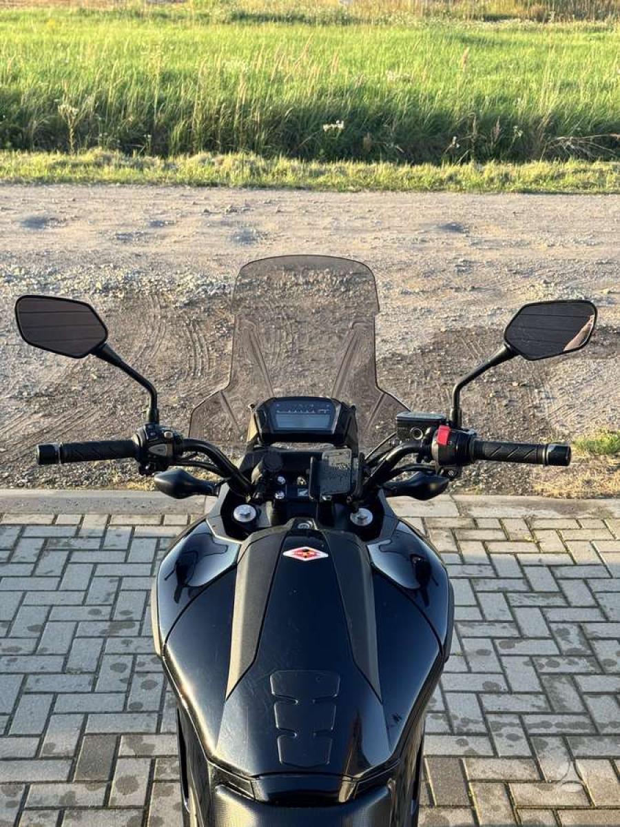 Black Honda NC 2013 in Panevezys, with an engine capacity of 0.70 L and mileage of 30 thousand km for 3900 €, photo 11 on AUTOMOTO.COM.LV