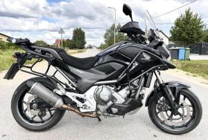 Black Honda NC 2013 in Vilnius, with an engine capacity of 0.67 L and mileage of 79 thousand km for 3350 €, photo  on AUTOMOTO.COM.LV