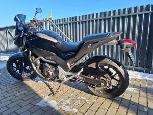 Black Honda NC 2014 in Panevezys, with an engine capacity of 0.70 L and mileage of 41 thousand km for 3099 €, photo  on AUTOMOTO.COM.LV